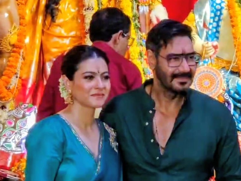 Ajay Devgn & Kajol twin in green during the Maha Navmi celebration